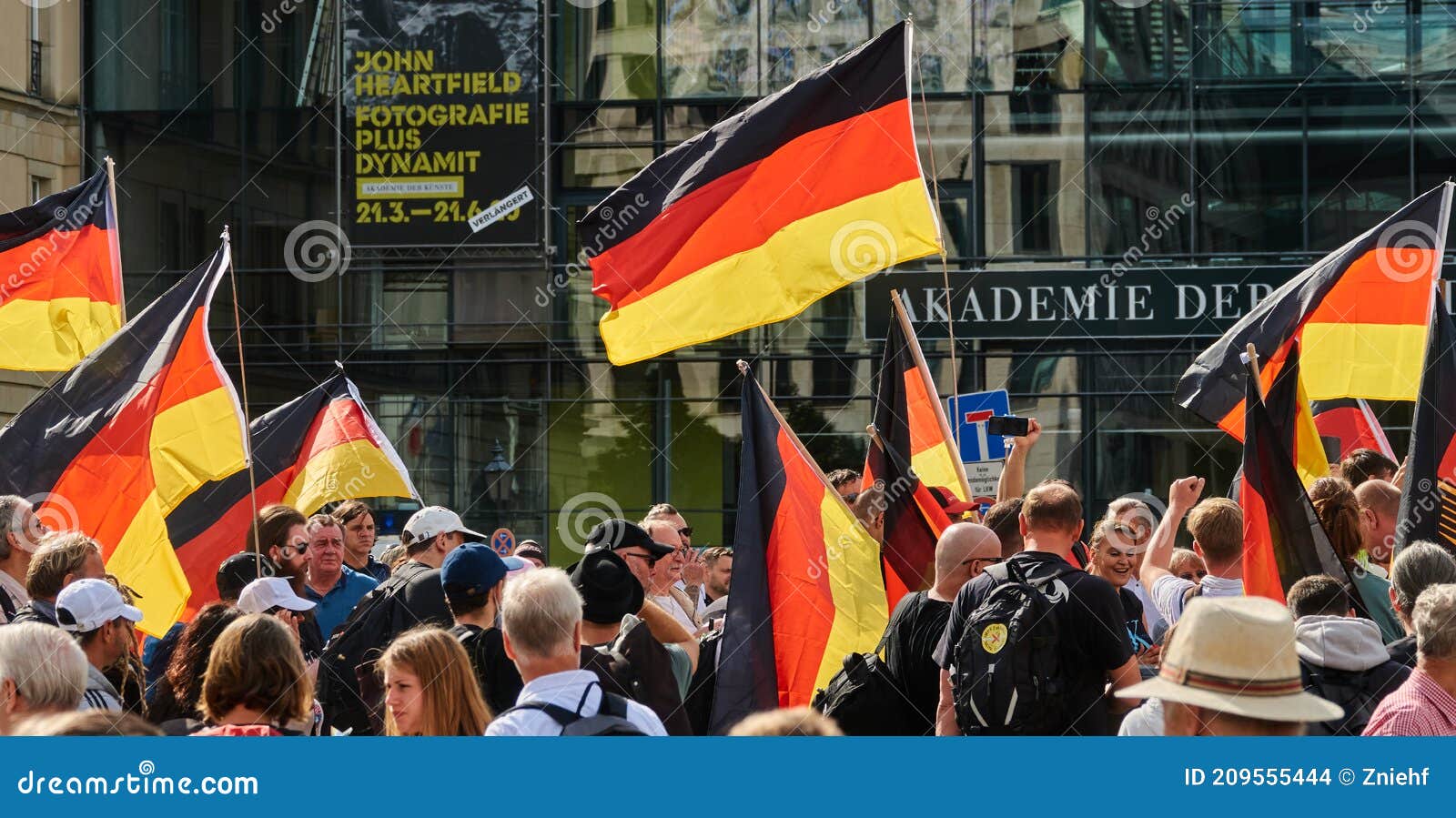 Demonstrators Wave the Black-red-gold Flag of Germany during a ...