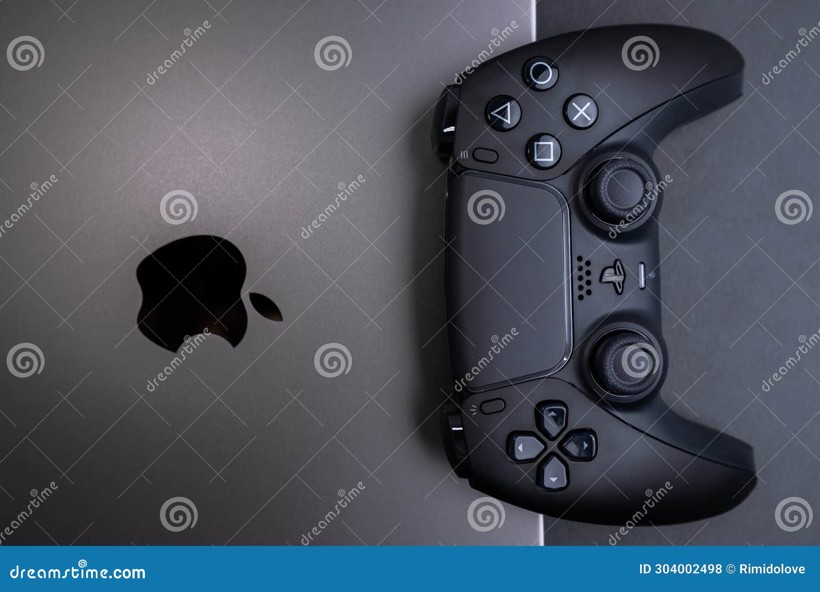 Apple Laptop and Controller, Perfect for Gaming on MacBook Editorial ...
