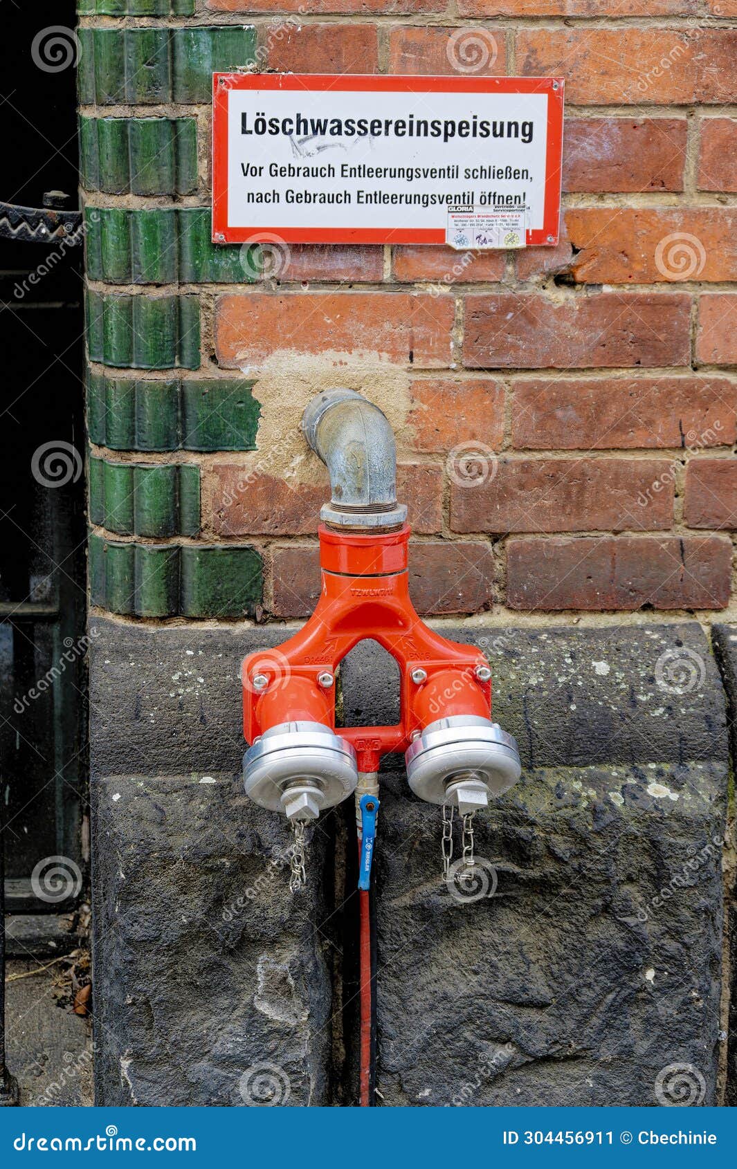 Fire Hydrant with Hose Connection for the Fire Brigade on a Building ...