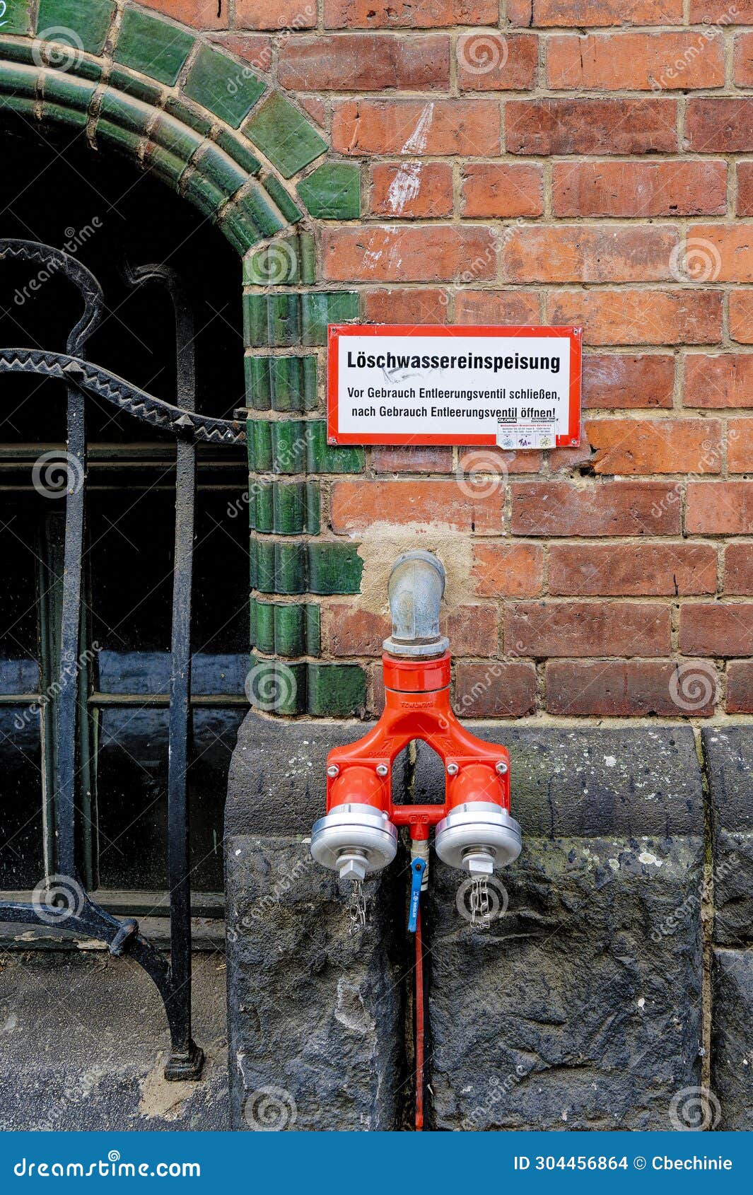 Fire Hydrant with Hose Connection for the Fire Brigade on a Building ...