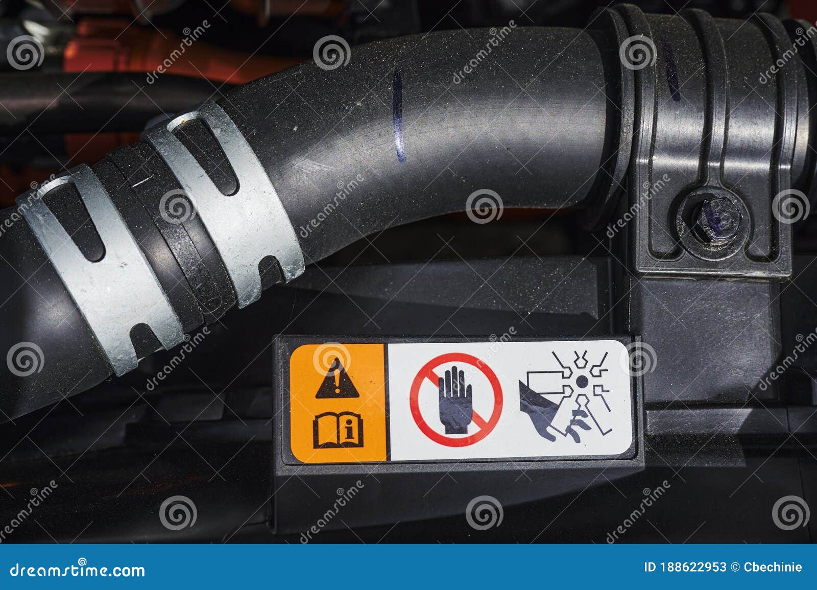 A Car Engine Bay With Various Components Including The Intake Manifold ...