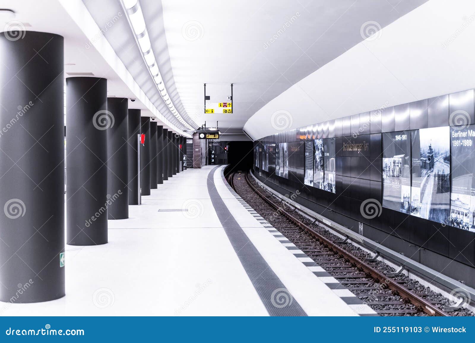 Berlin Subway Station with Black Columns and White Walls. Editorial ...