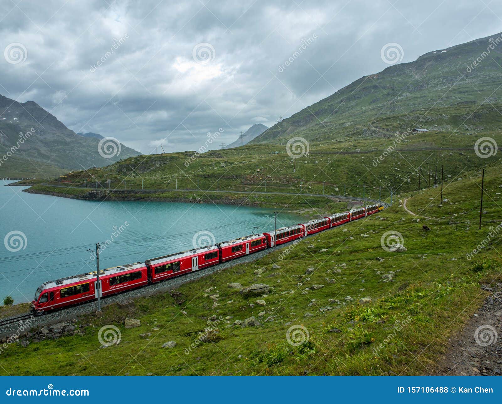 Bernina Express Train Riding Down The Famous Brusio Spiral Viaduct ...