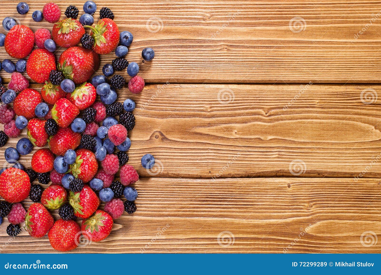 Berries Scattered on the Table Stock Image - Image of strawberry, ripe ...