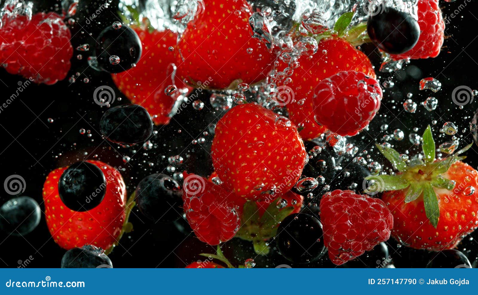 Berry Fruit Pieces Falling Down and Splashing Underwater Stock Photo ...