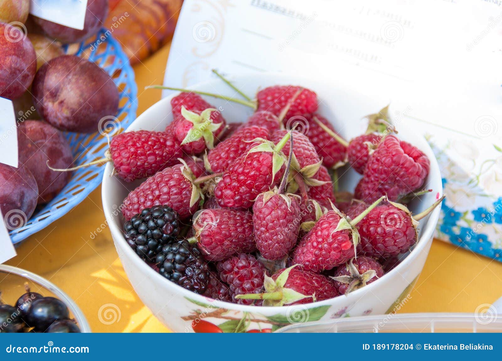 Berry Raspberries in a Cup on the Table Stock Photo - Image of berry ...