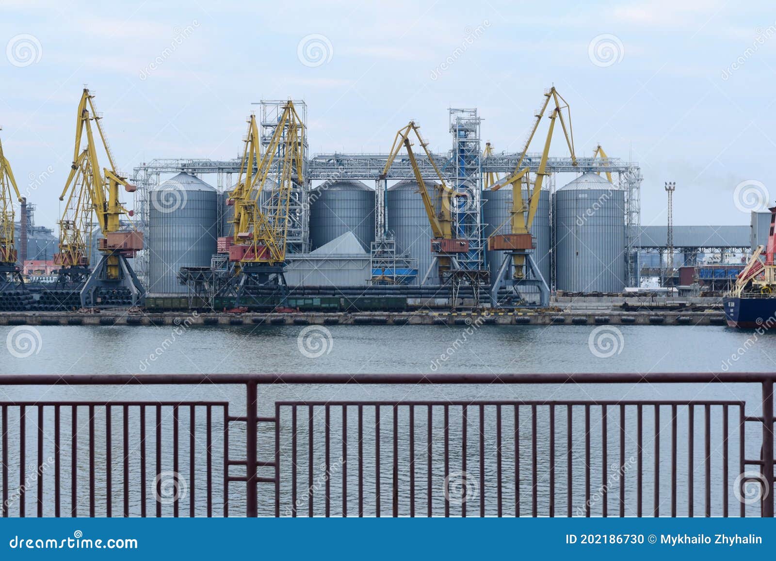 Loading Grain On A Ship In The Port. View From The River To The Port ...