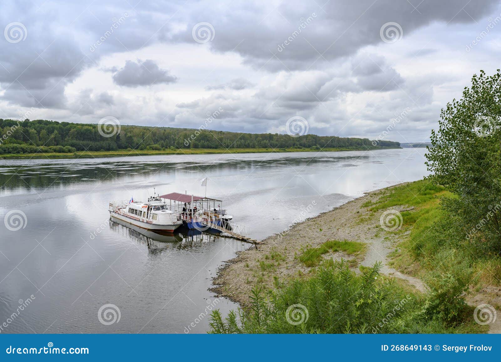 Berth with Tourist Ships Under a Stormy Sky on the Tom River in Siberia ...