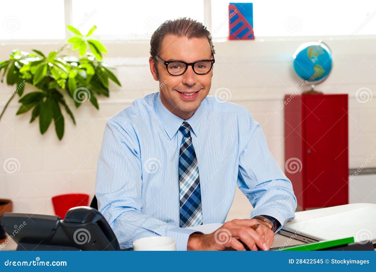Bespectacled Senior Manager Working in His Office Stock Image - Image ...