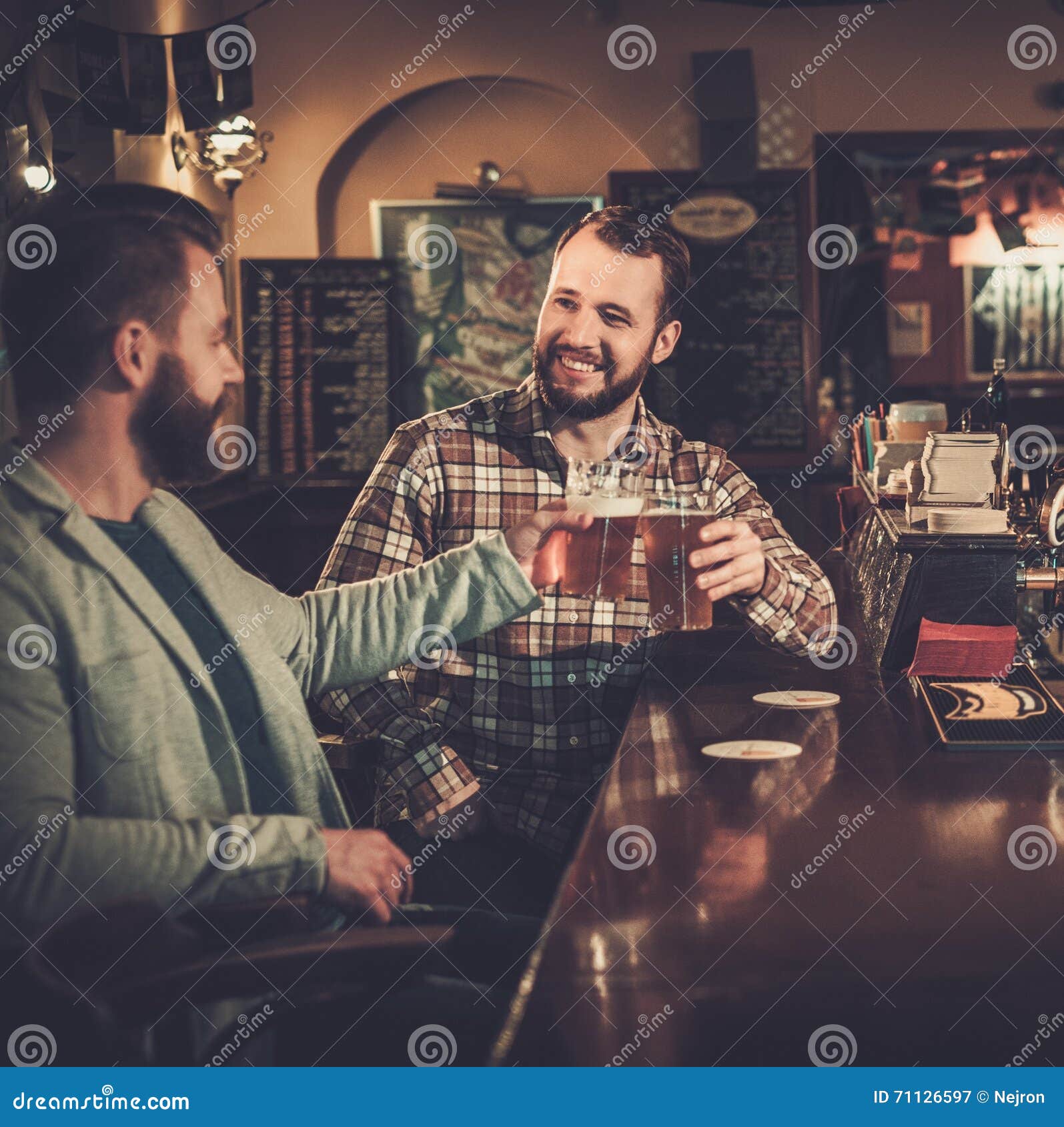 Best Friends Having Fun and Drinking Draft Beer at Bar Counter in Pub ...