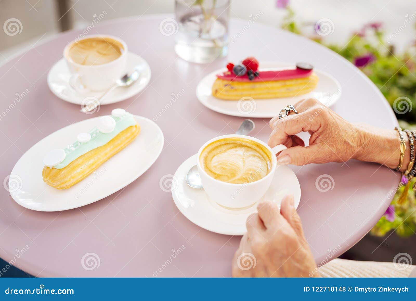 Lickerish Eclair and Coffee Putting on Surface Stock Photo - Image of ...