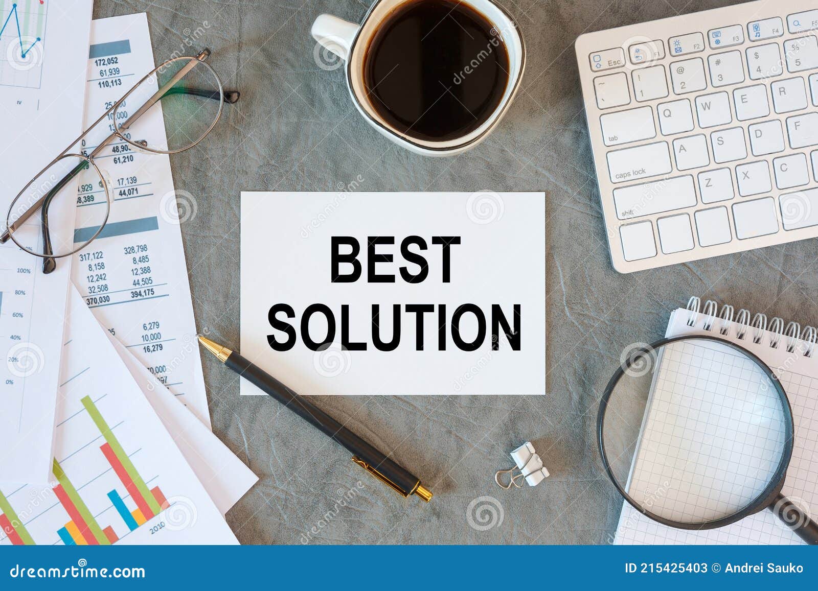 BEST SOLUTION is Written in a Document on the Office Desk, Keyboard and ...