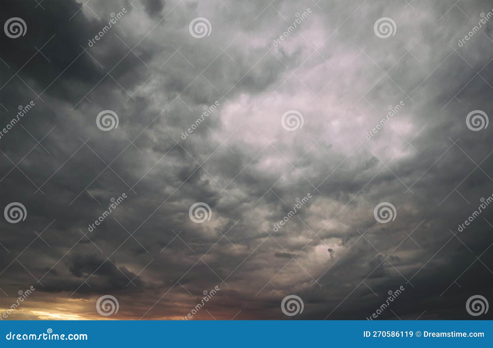 Rainy Clouds Over Black Catchment With Fence Stock Image ...