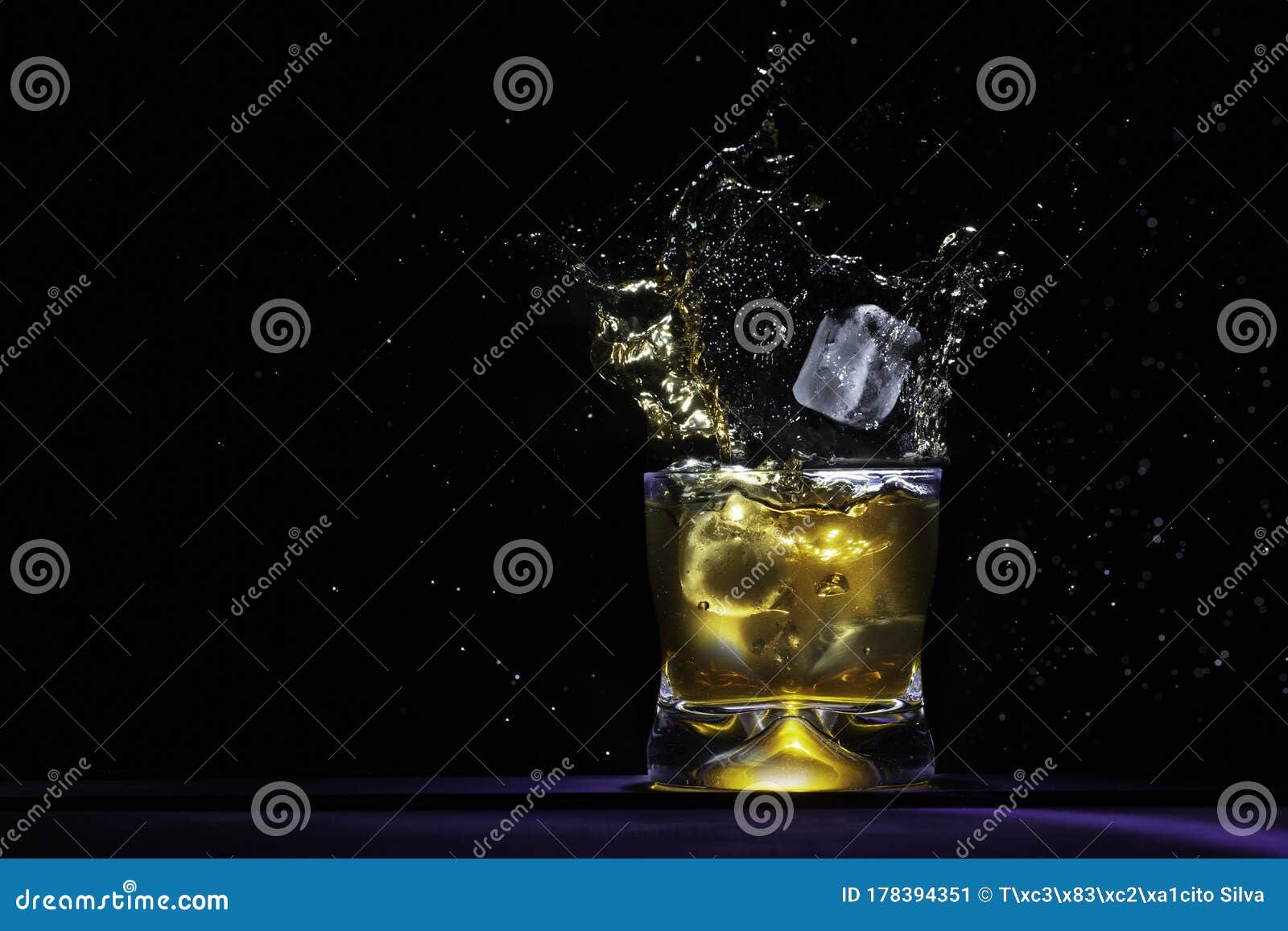 Beverage Splash with Spills Out of Glass Stock Image - Image of liquor ...
