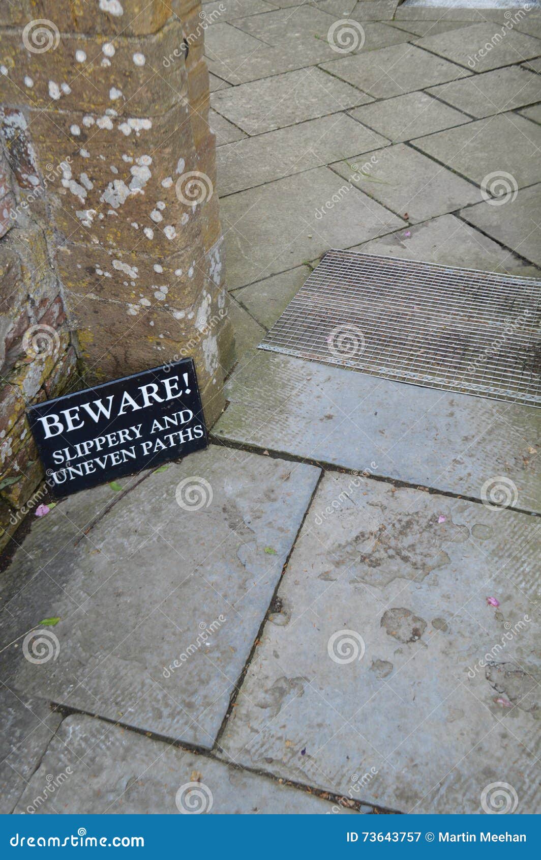 Beware Slippery and Uneven Paths Sign. Stock Image - Image of garden ...