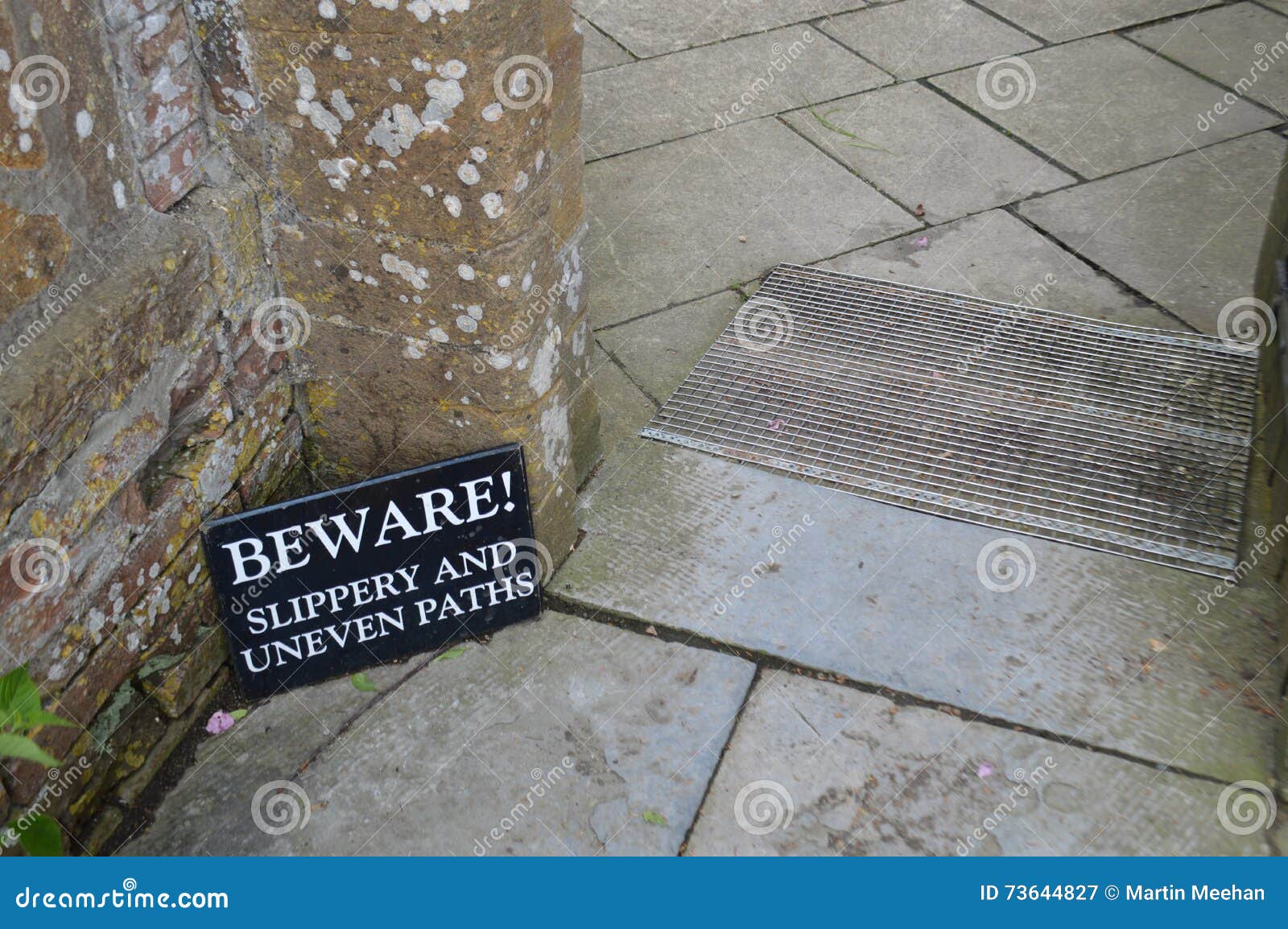 Beware Slippery and Uneven Paths Sign. Stock Image - Image of ground ...