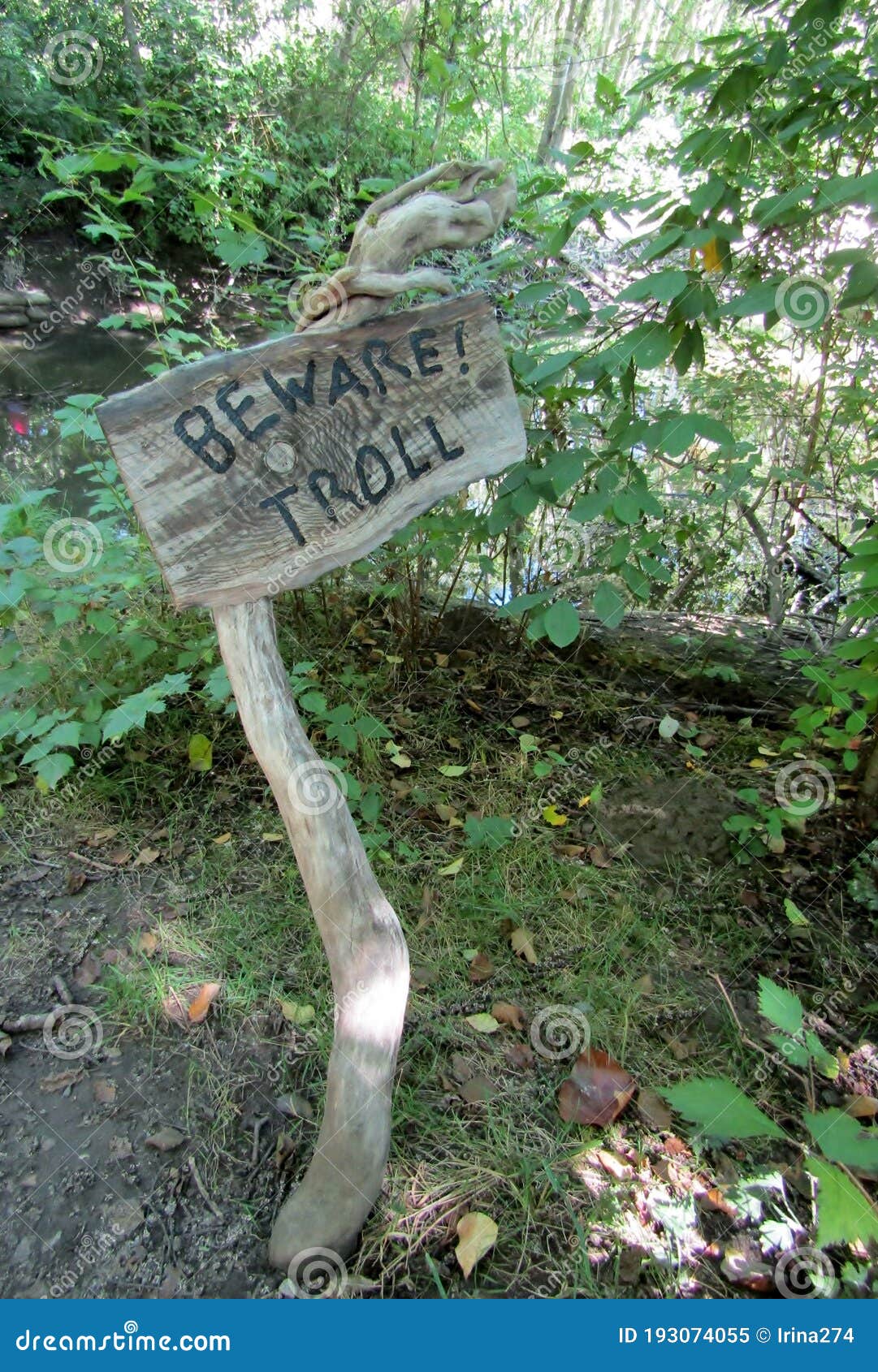Beware! Trolls Sign in the Forest Stock Image - Image of canada, forest ...