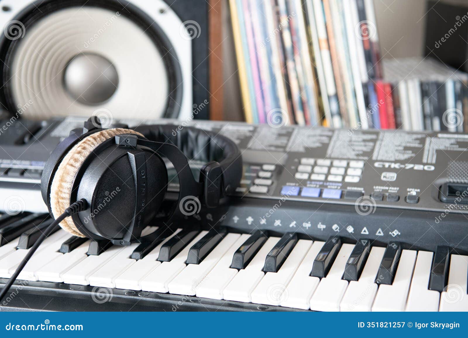 Beyerdynamic Headphones on Piano with Sound System in the Background ...