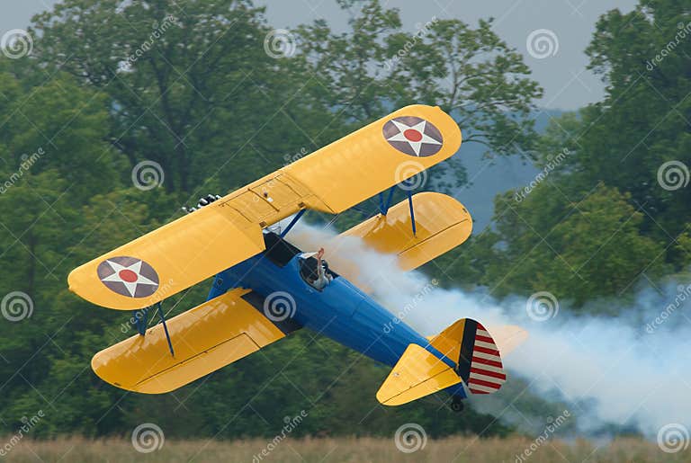 Bi-plane Flying Sideways stock photo. Image of stearman - 199360