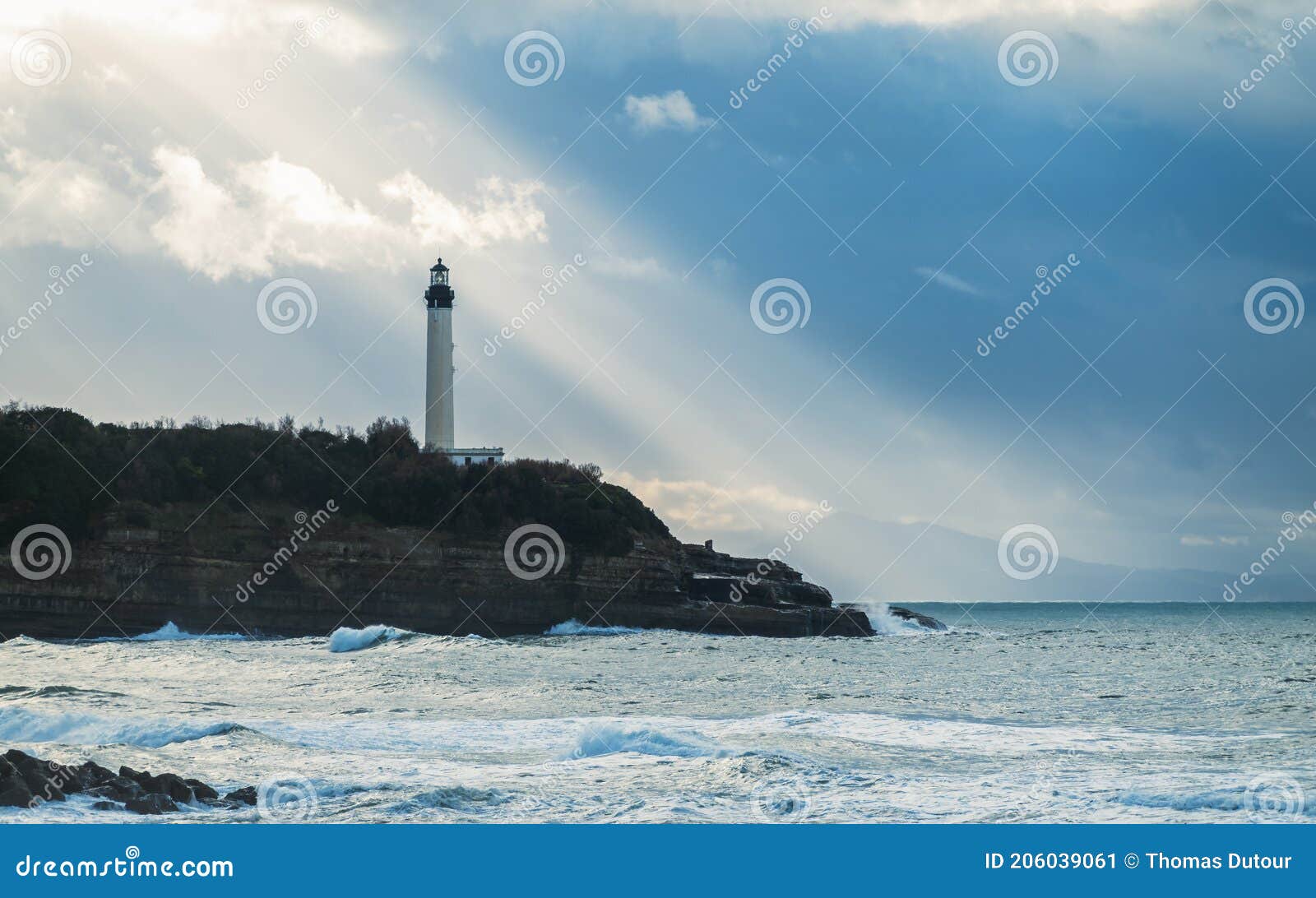 Biarritz Lighthouse in France Stock Image - Image of sunray, cloudy ...