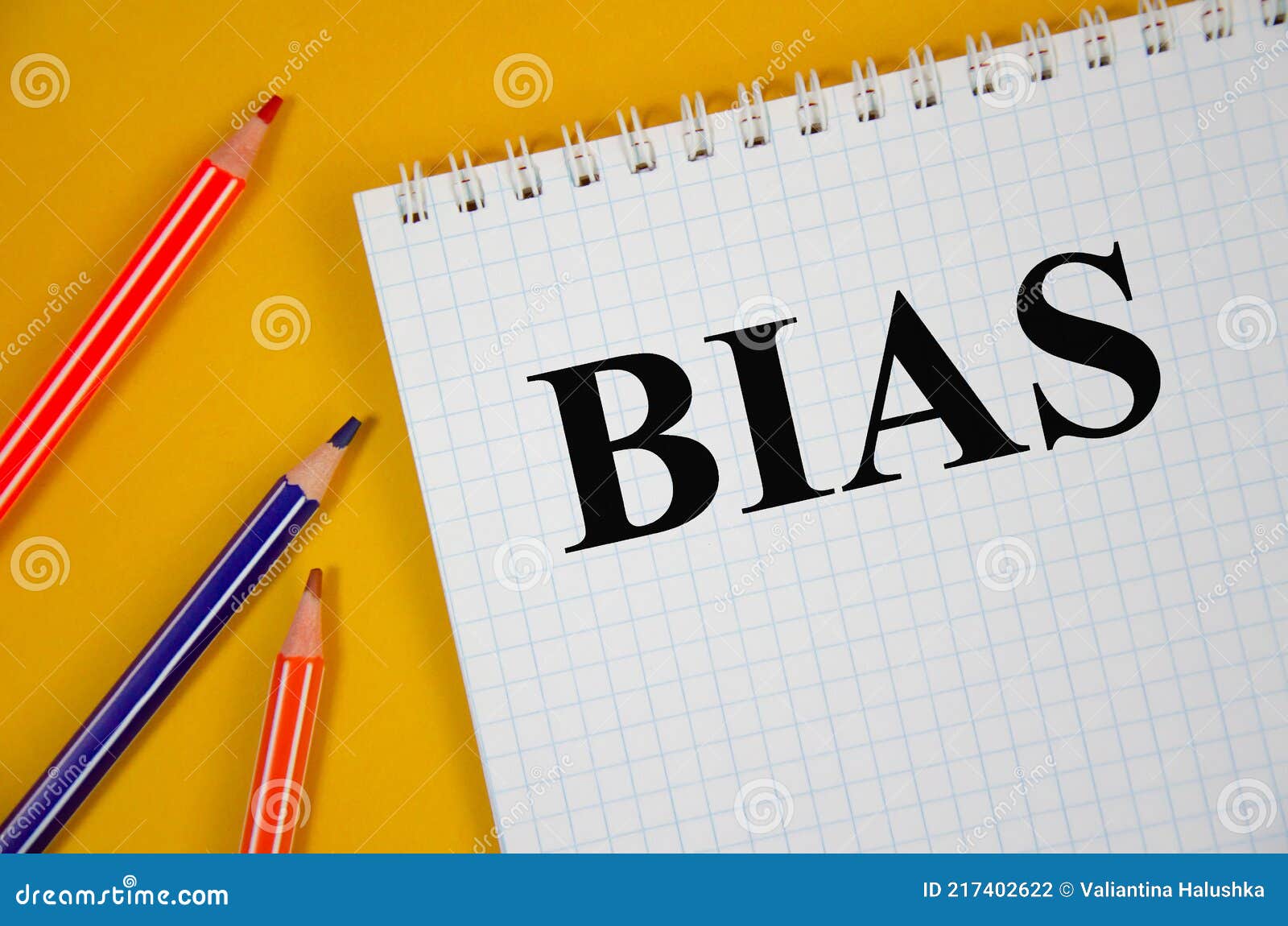 Handwriting Text Bias Word Written on White Notepad and Yellow ... Handwriting Text Bias Word Written on White Notepad and Yellow ...