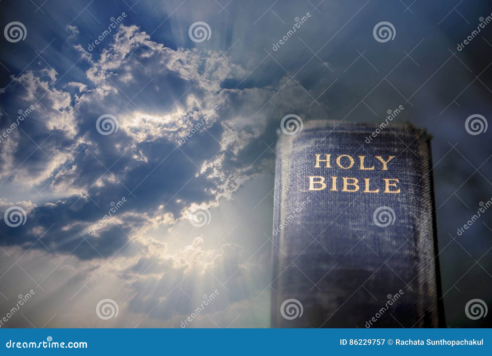 Bible into Bright Sunlight Shining through Clouds Stock Image - Image ...