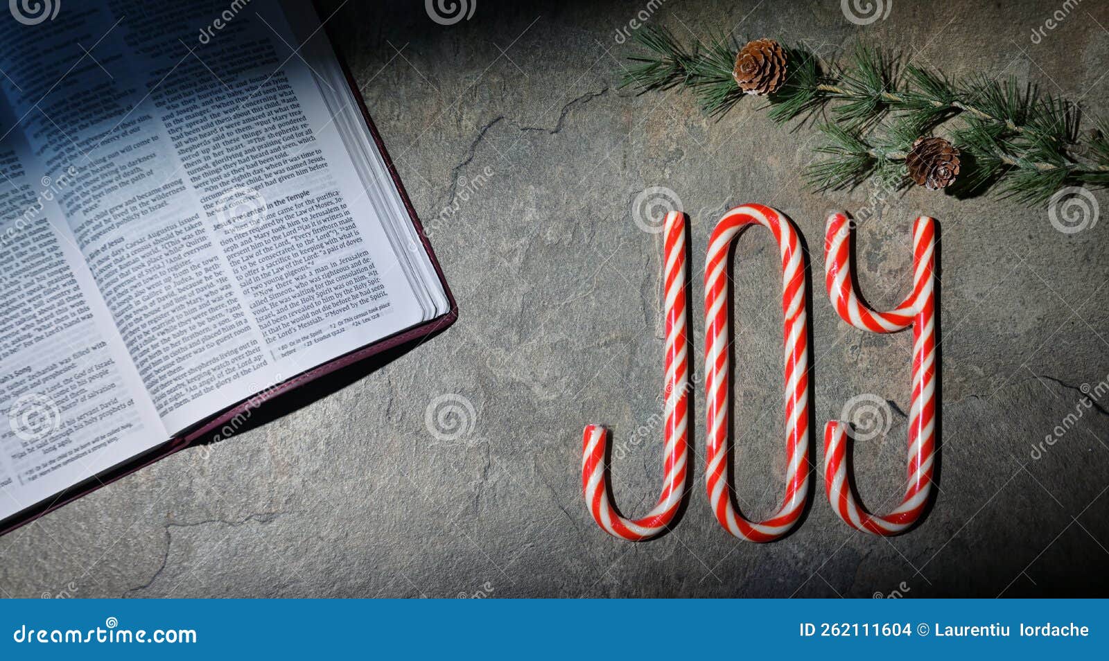 Bible and Joy Written with Candy Canes on Stone Table Stock Photo ...