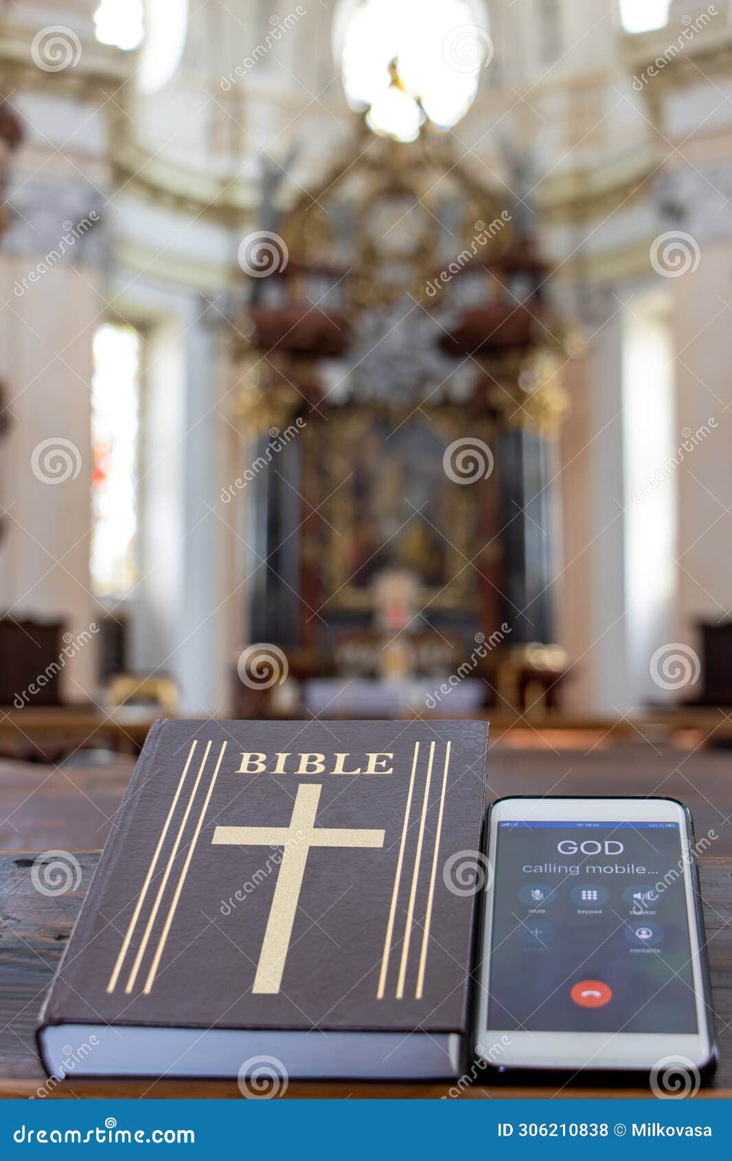 The Bible with Mobile Phone on the Table of a Prayer Bench in the ...