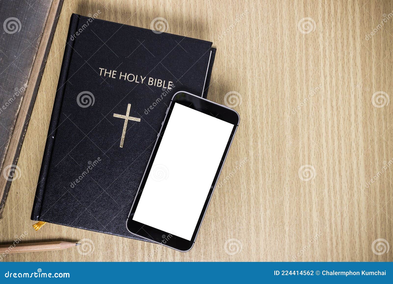 A Bible with Mock Up Phone on Table. Stock Photo - Image of phone, holy ...
