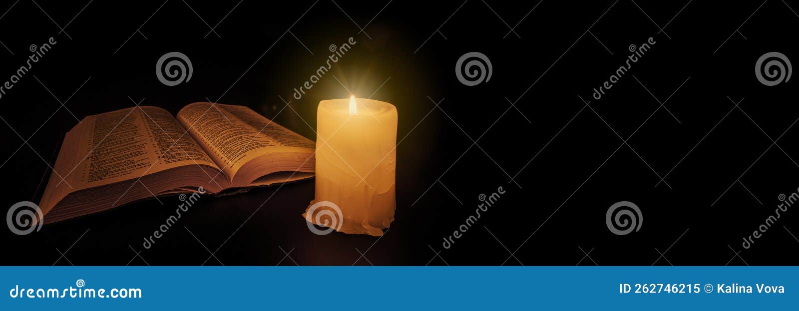 A Bible on the Table in the Light of a Candle Stock Image - Image of ...