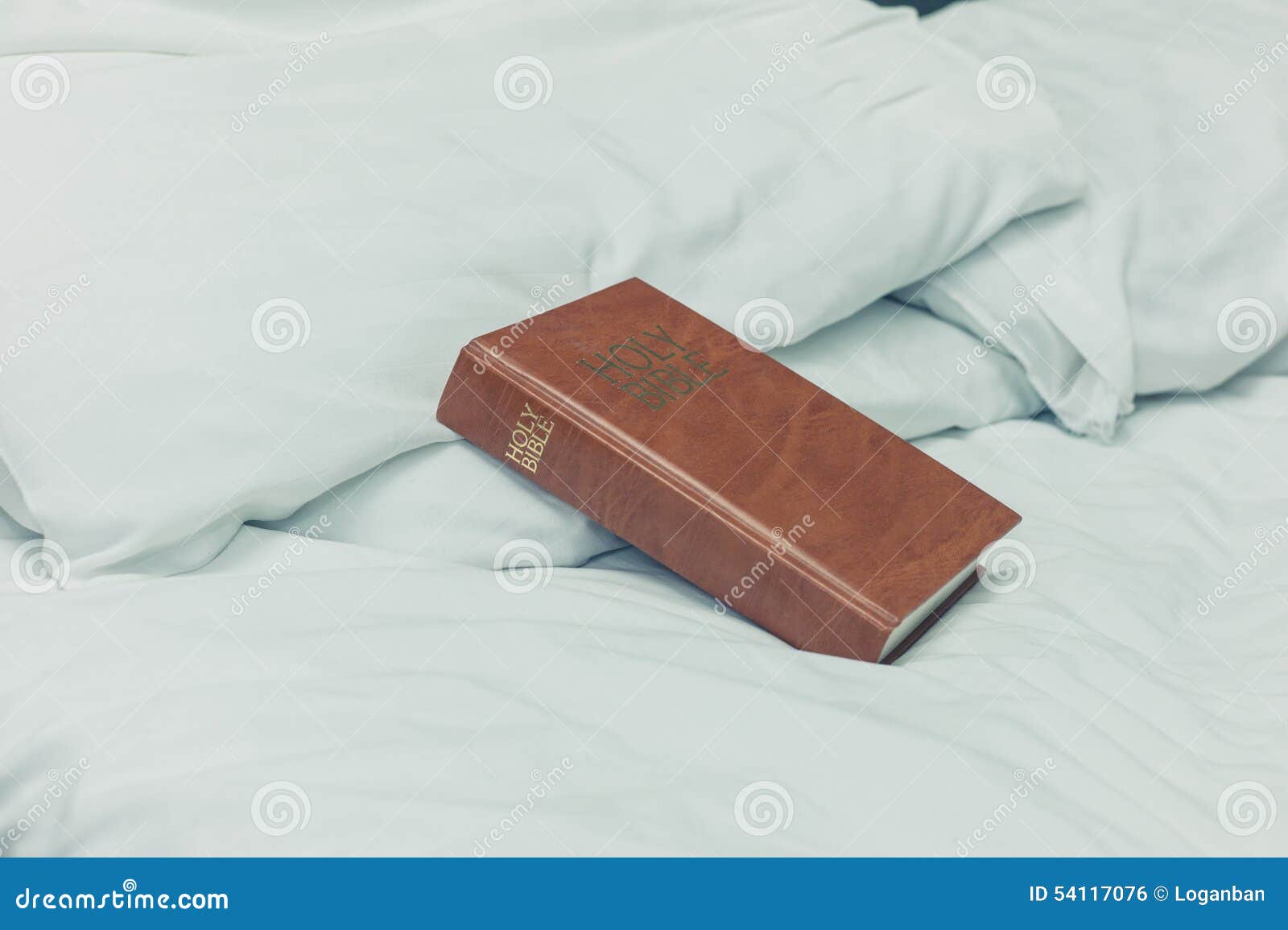 Bible on White Sheets and Bed Stock Photo - Image of books, filter ...