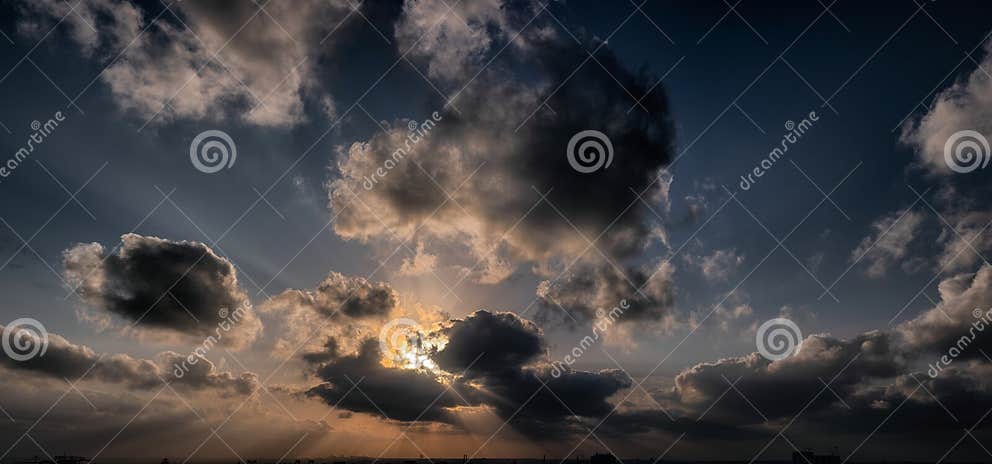 Biblical Sunset with God Rays Beaming Stock Photo - Image of clouds ...