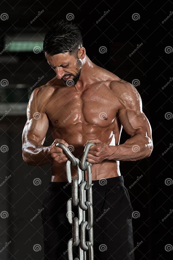 Biceps Exercise with Chains Stock Photo - Image of building, chain ...