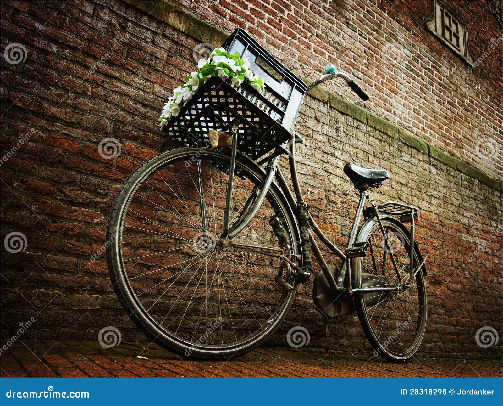 Bicycle against brick wall stock photo. Image of amsterdam - 28318298