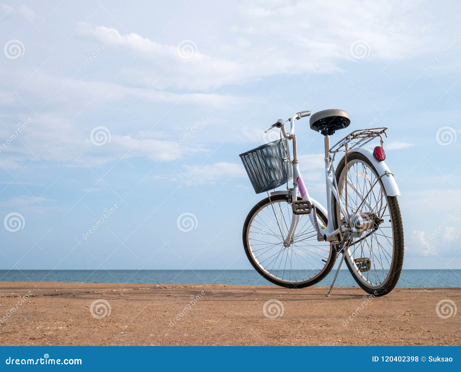 Bicycle beside the beach. stock photo. Image of coast - 120402398