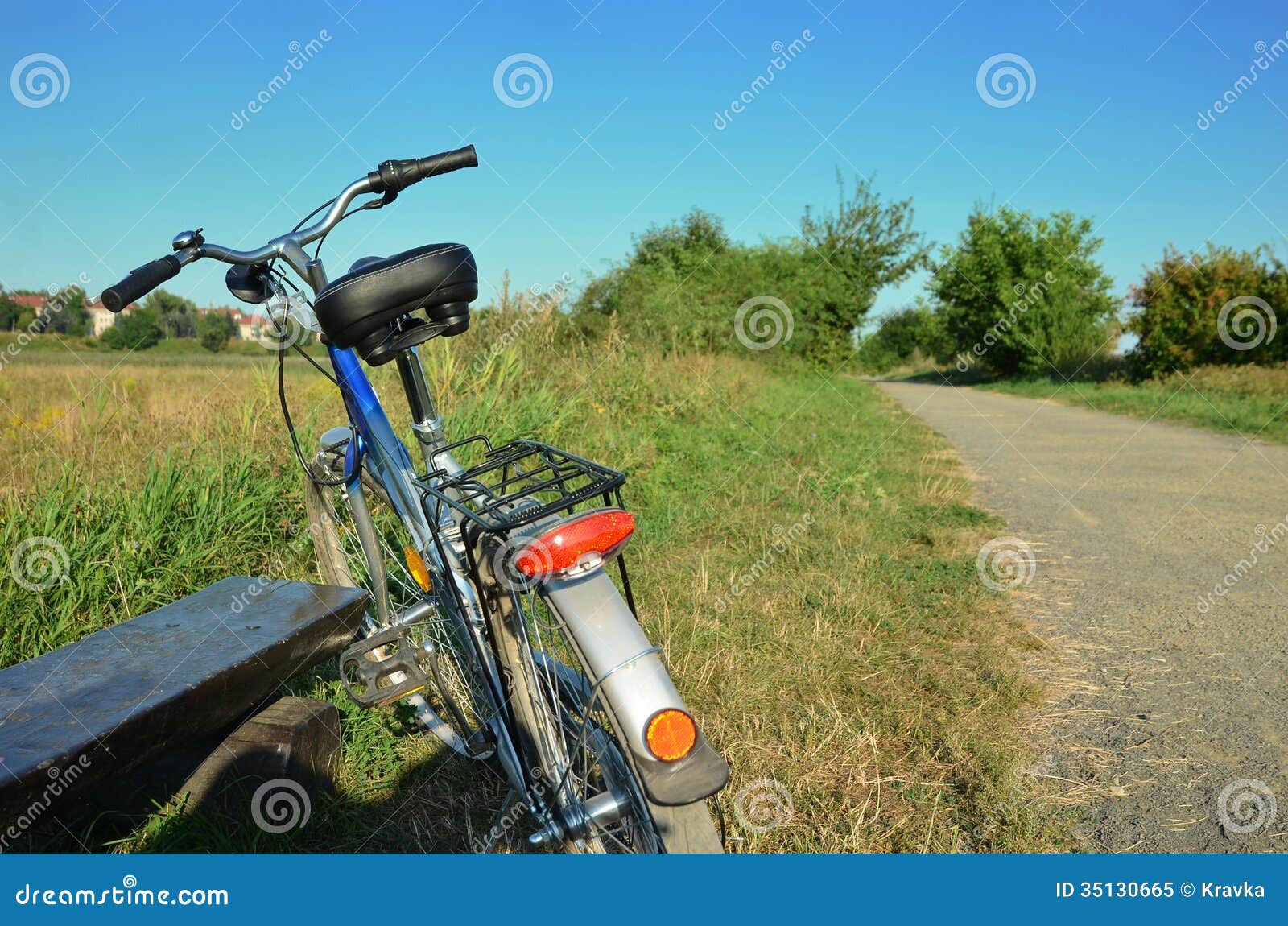 Bicycle with a bench stock image. Image of biking, countryside - 35130665