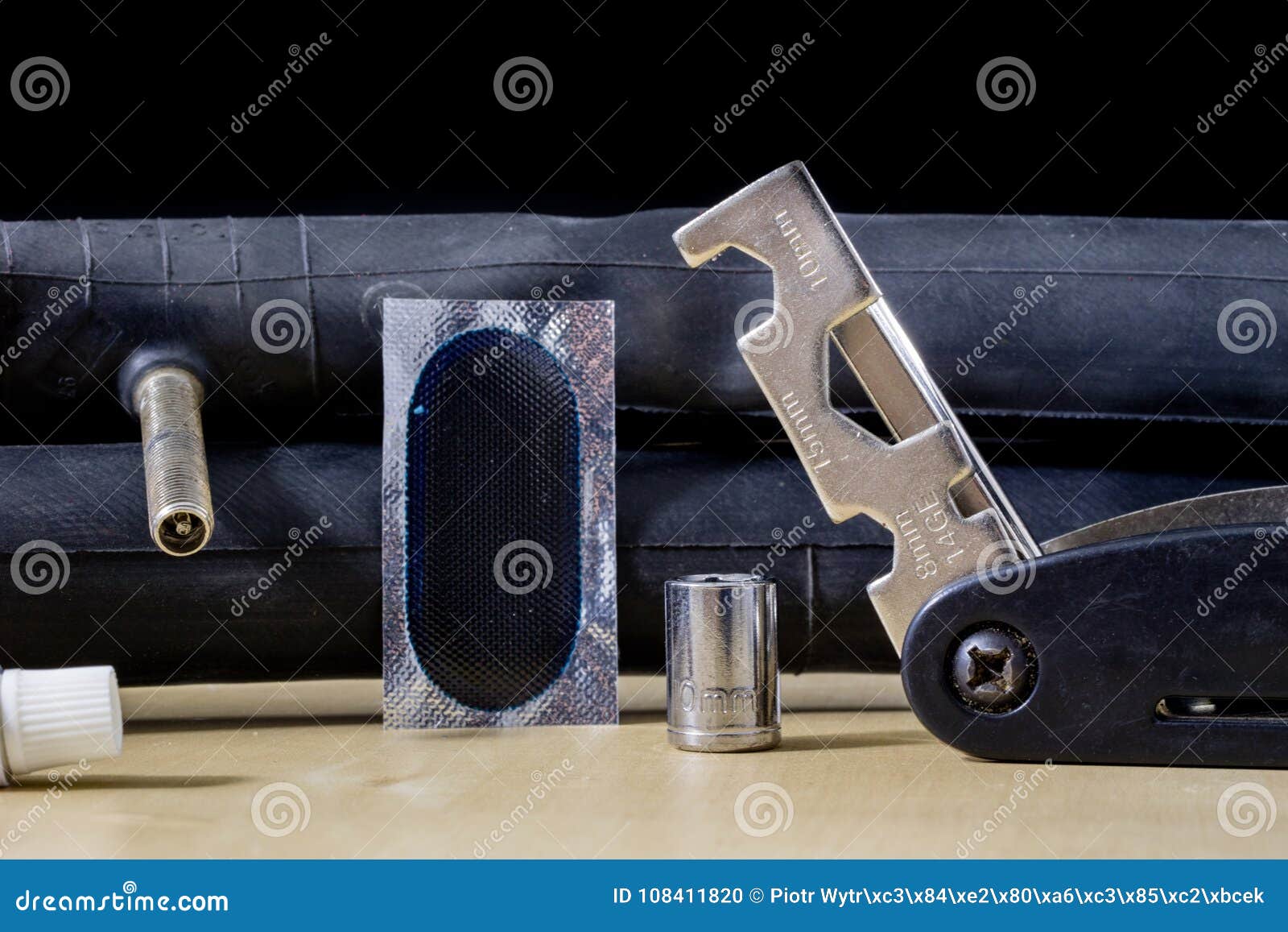 Bicycle Breakdown during the Trip. Sticking a Bicycle Tube in a Stock ...