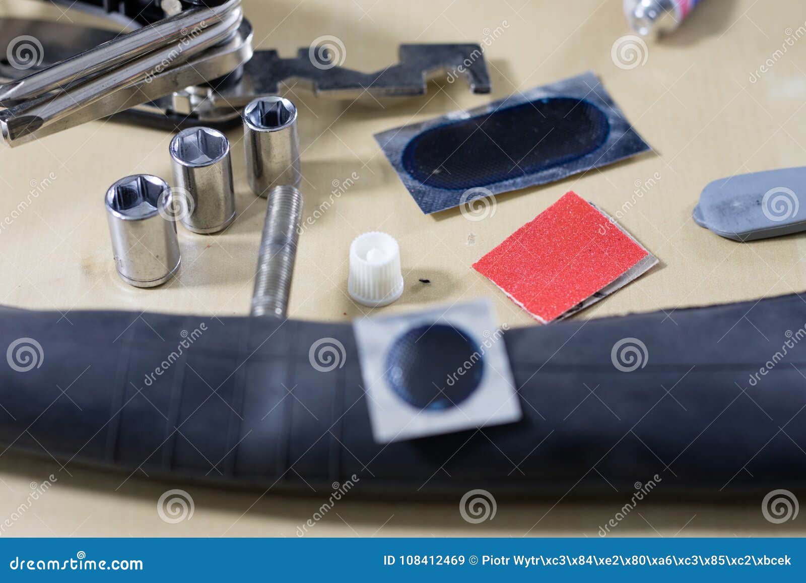 Bicycle Breakdown during the Trip. Sticking a Bicycle Tube in a Stock ...