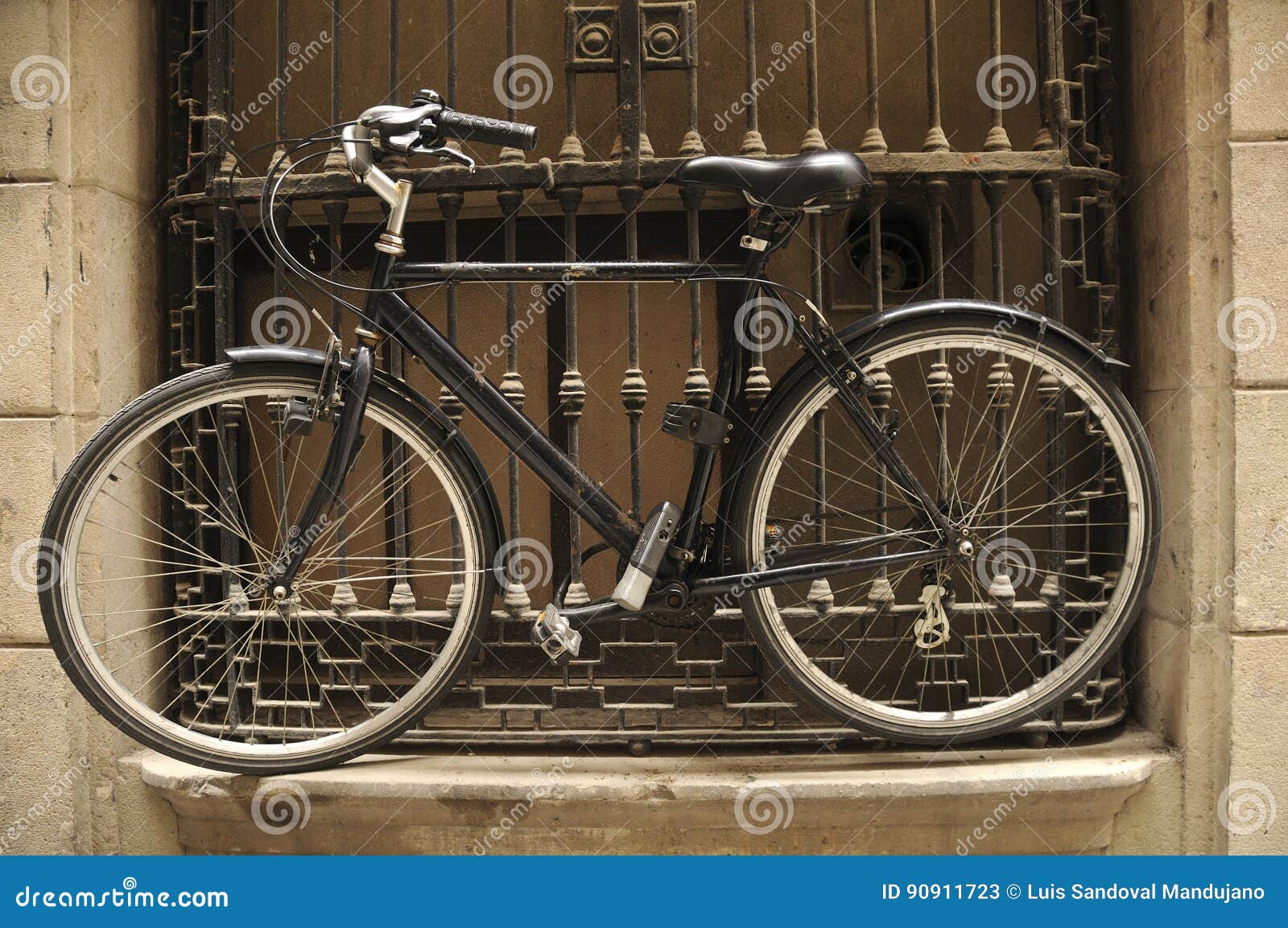 Bicycle chained to window stock image. Image of bicycle - 90911723