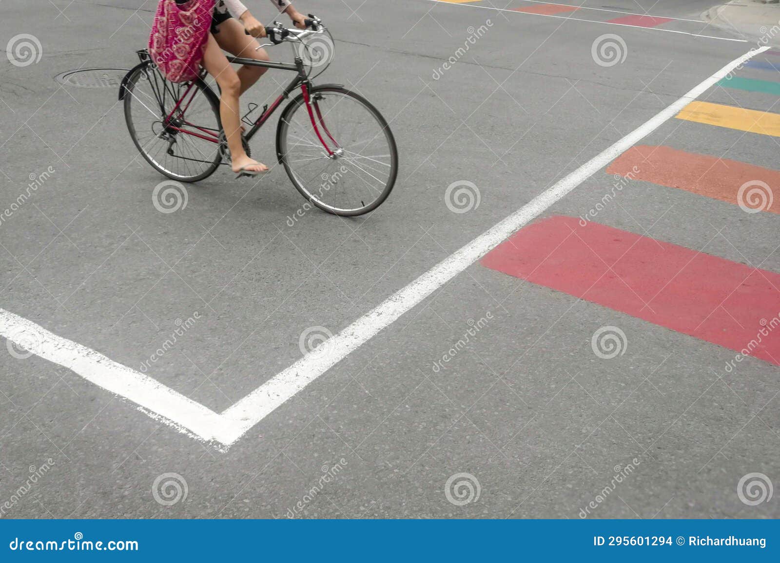 A Bicycle is Crossing a Rainbow Colored Pedestrian Path Stock Photo ...