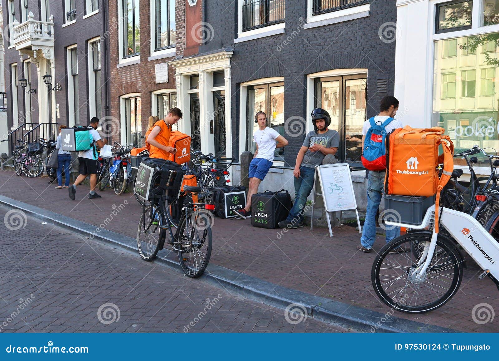 Bicycle food delivery editorial stock image. Image of capital - 97530124 Bicycle food delivery editorial stock image. Image of capital - 97530124