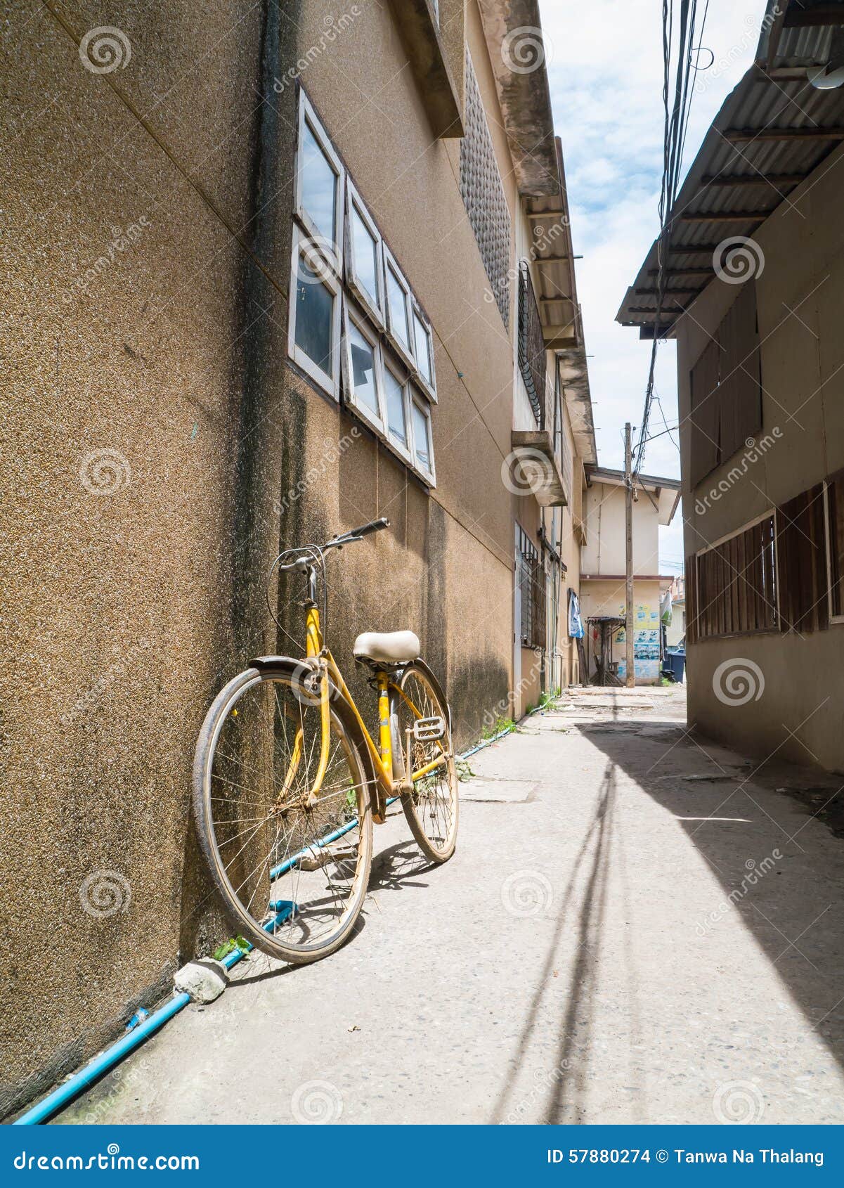 Bicycle lean on a wall stock photo. Image of wall, bicycle - 57880274