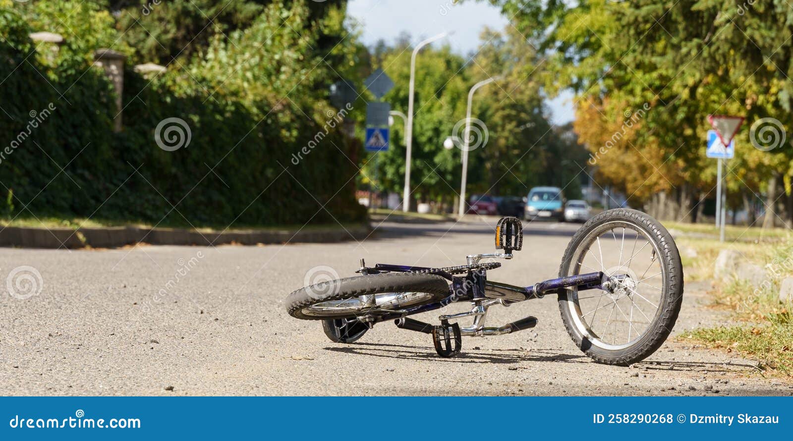 A Bicycle Lies on the Road after a Car Hit a Cyclist. Stock Photo ...