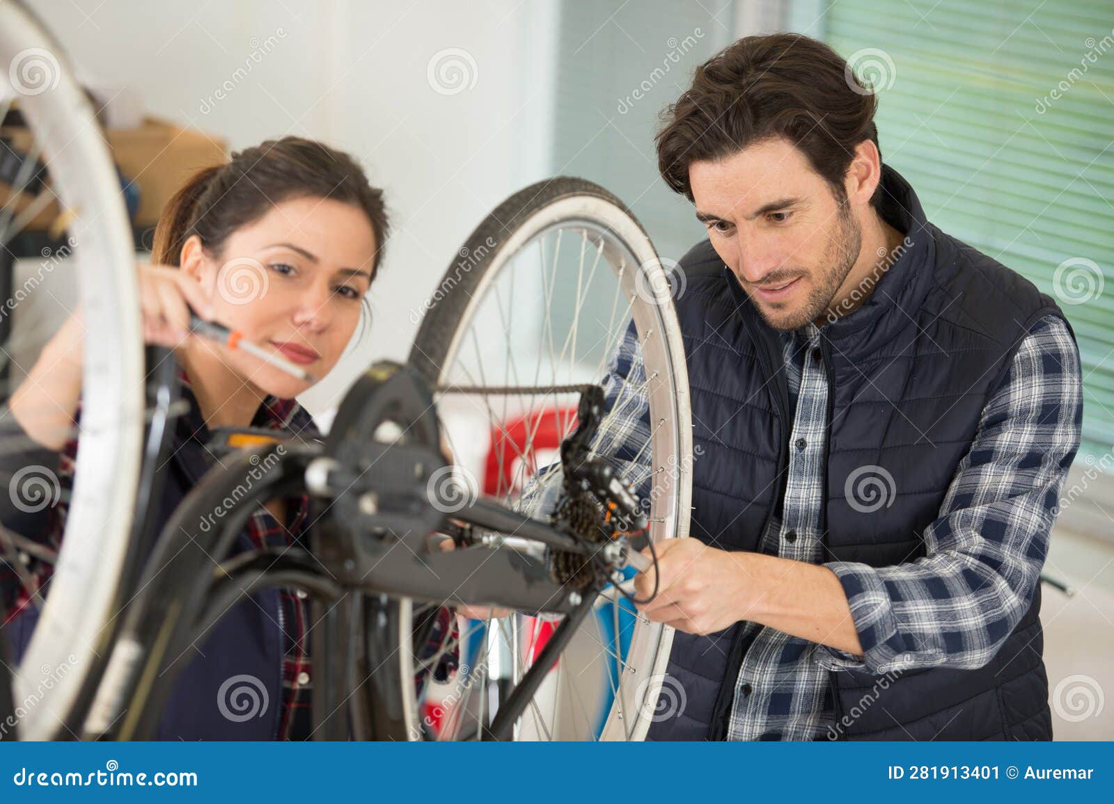 Bicycle Mechanics Fixing Bike Wheel Stock Image - Image of technician ...