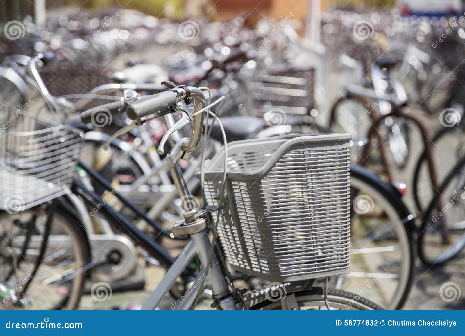 Bicycle parking in Japan stock photo. Image of cyclist - 58774832