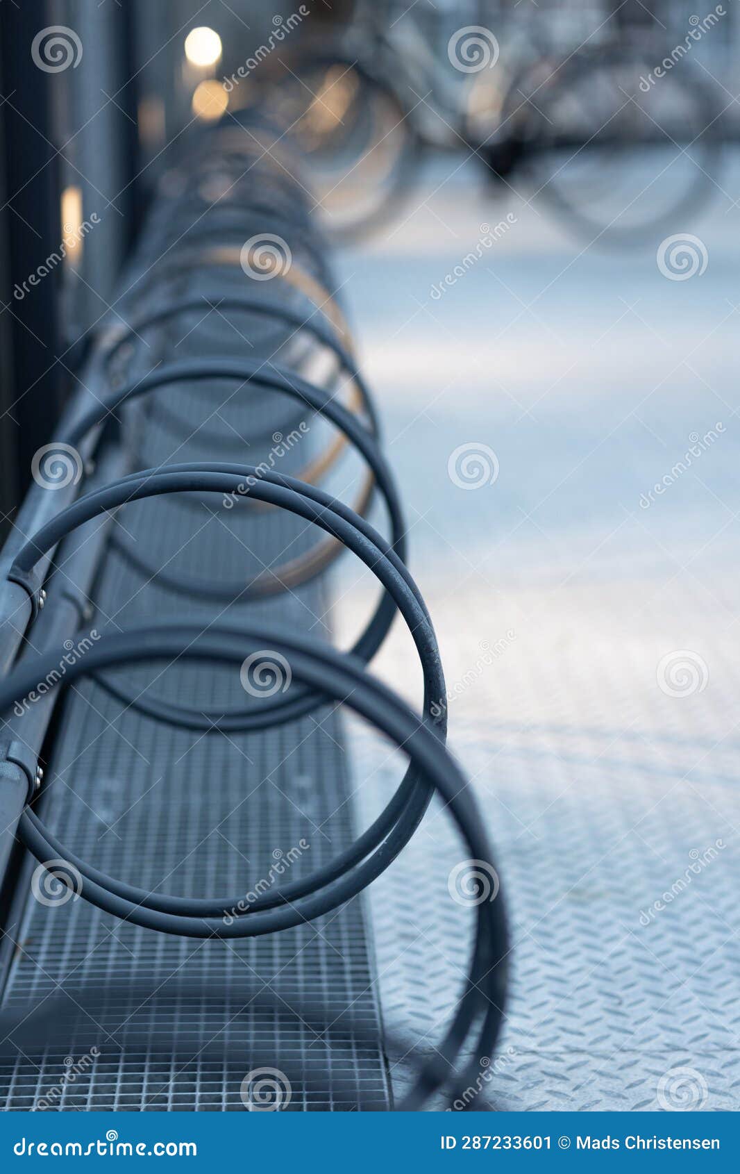 Bicycle Parking Ring Making Pleasing Curves at Night on Train Station ...