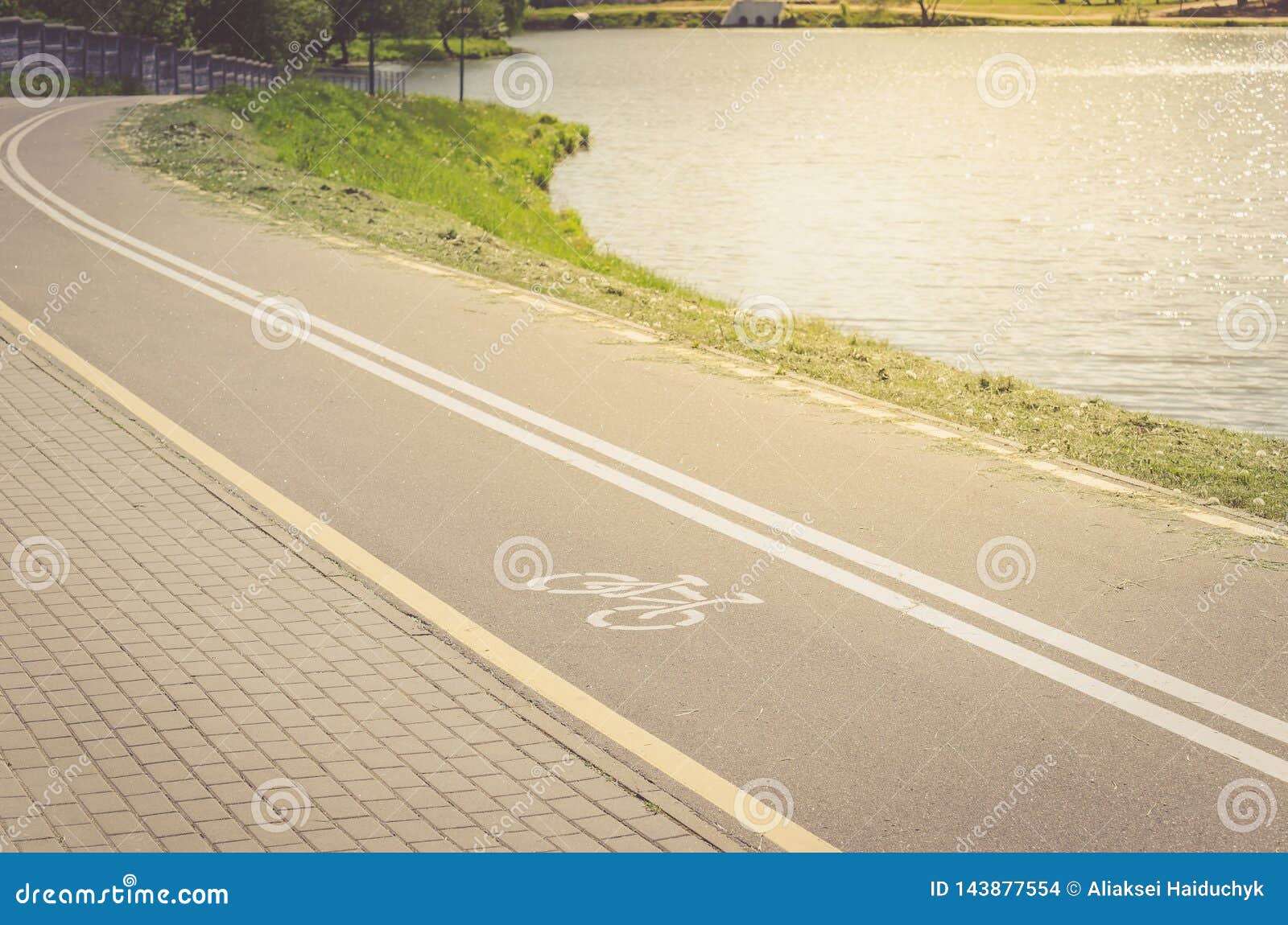 Bicycle Path Along the Lake/bicycle Path Along the Lake in Sunrise ...