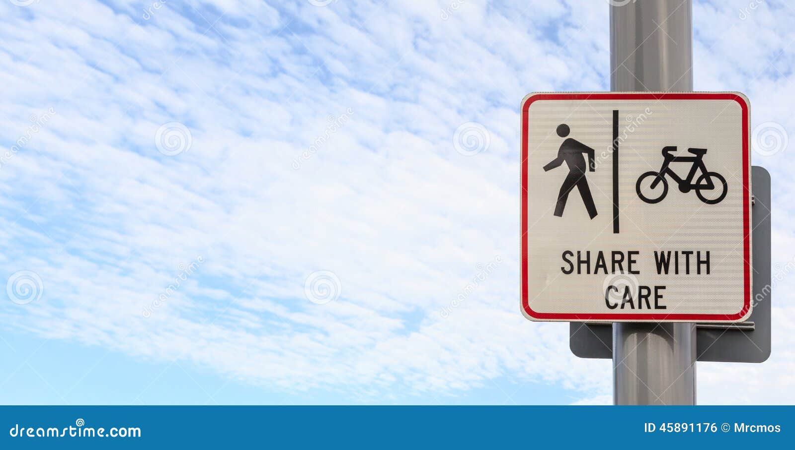 Bicycle and Pedestrian Shared Route Sign on Pole Post Against Bl Stock ...