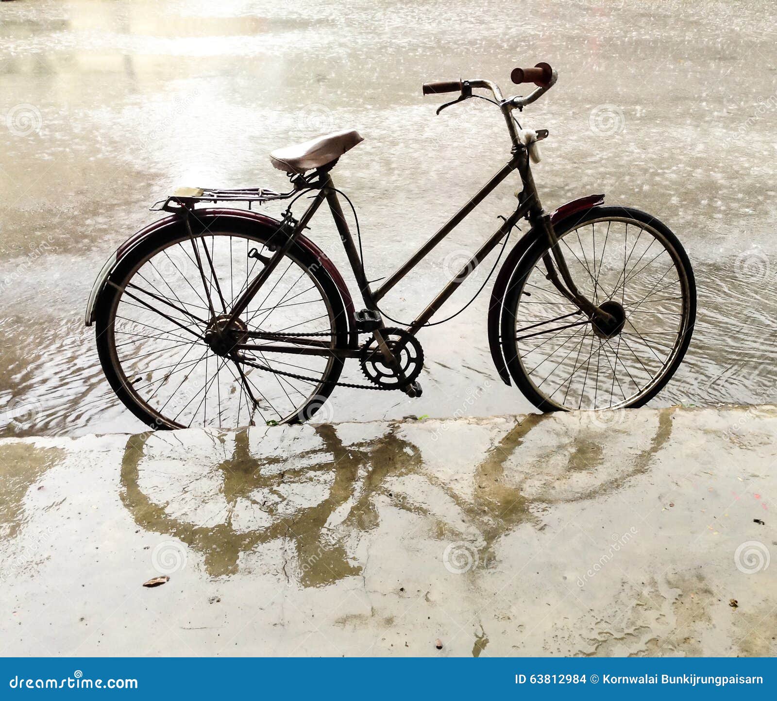 Bicycle in the rain stock photo. Image of brake, urban - 63812984