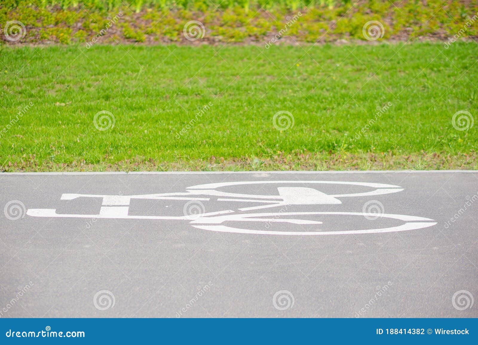 Bicycle Route with a Symbol in Front of Green Grass Stock Photo - Image ...